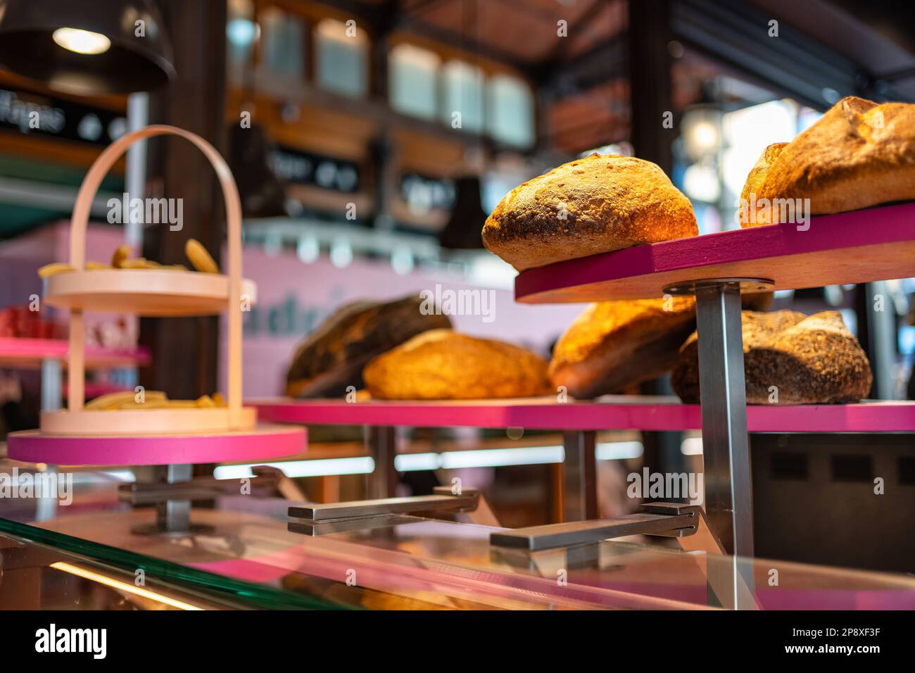 Bakery showcase with shelves and breads of various types exposed for ...