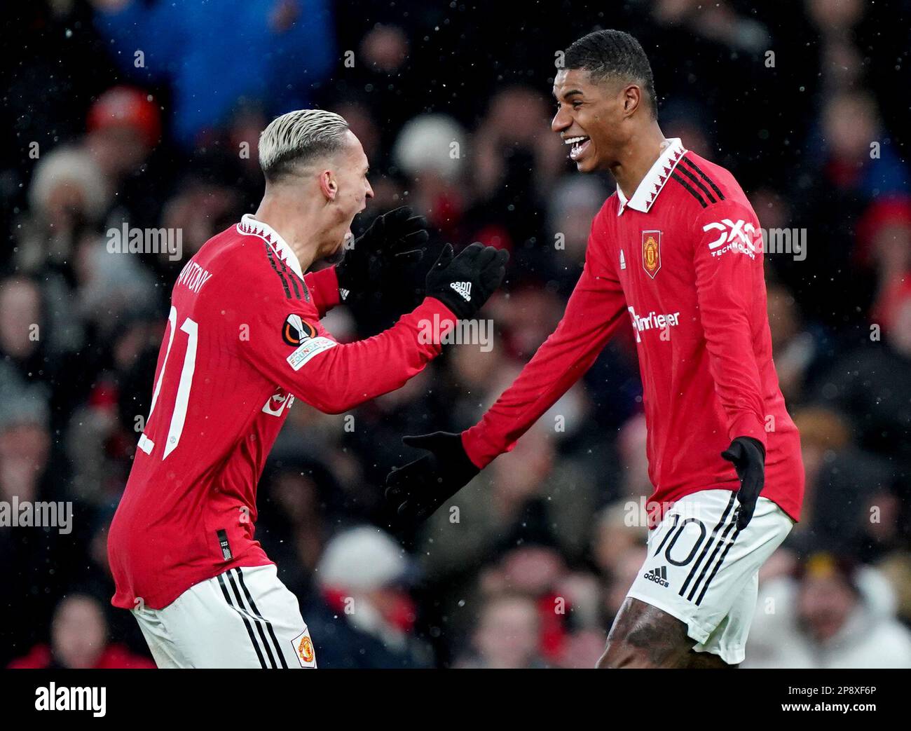Manchester United's Antony (left) celebrates scoring his sides second ...
