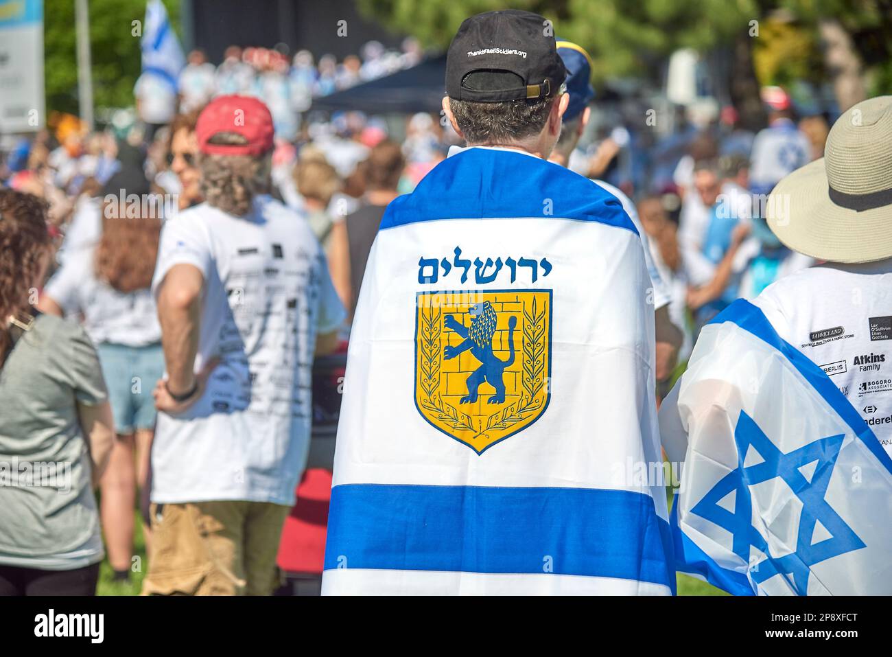 Toronto, Ontario Canada- May 29th, 2022: A man wearing the flag of ...
