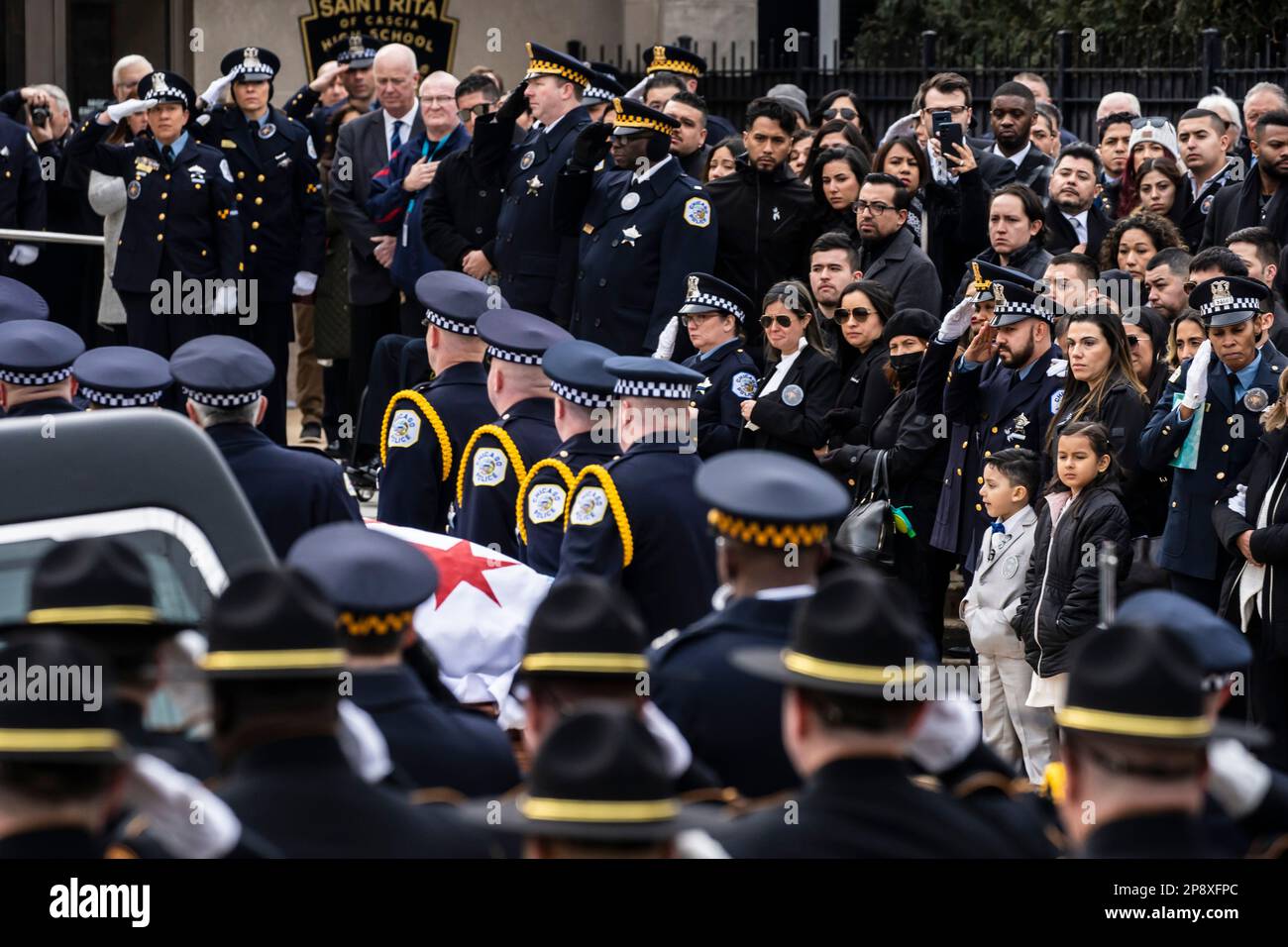 Family members and supporters mourn as pallbearers carry the casket for ...