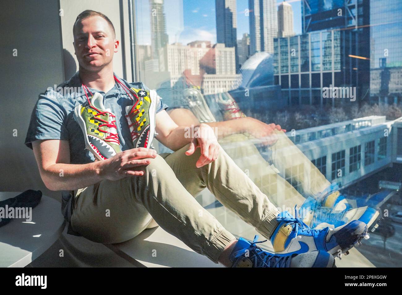 Baseball player Alex Katz shows off his custom cleats, Wednesday, March ...