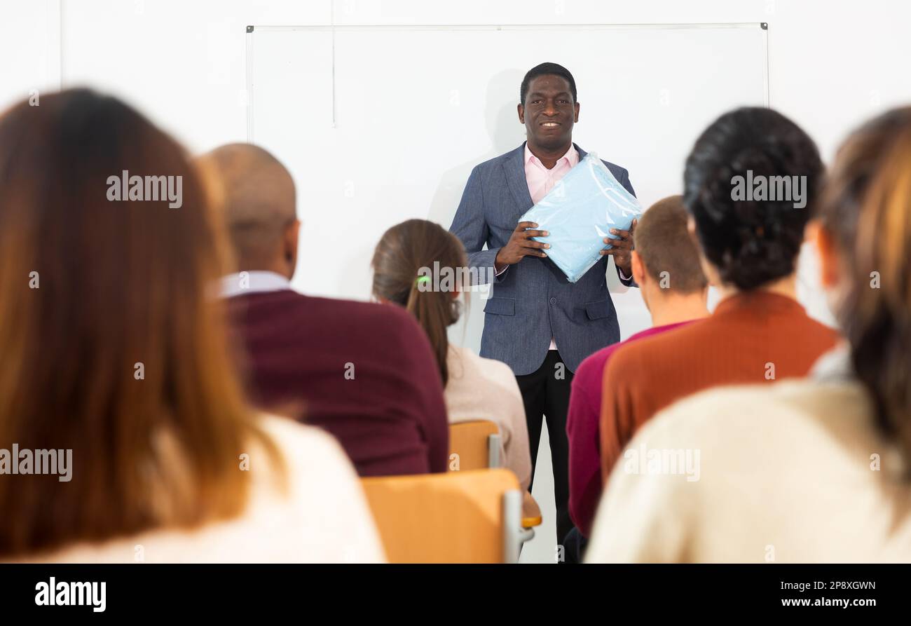African american coach businessman giving talk at modern office ...