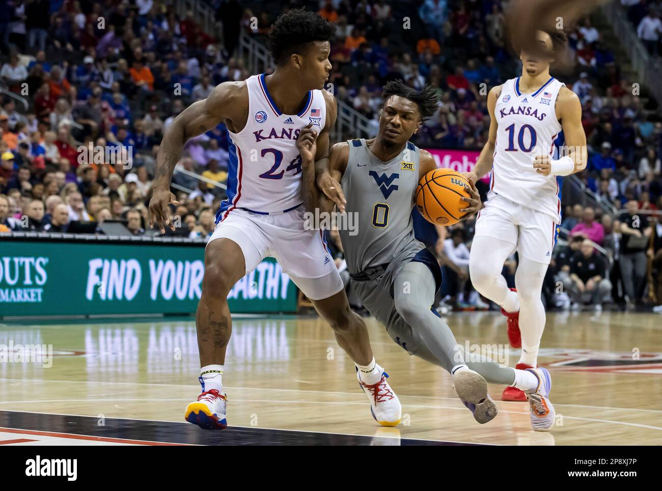 KANSAS CITY, MO - MARCH 09: West Virginia guard Kedrian Johnson (0 ...