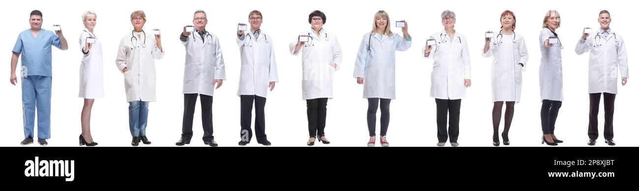 full length group of doctors showing badge isolated Stock Photo - Alamy