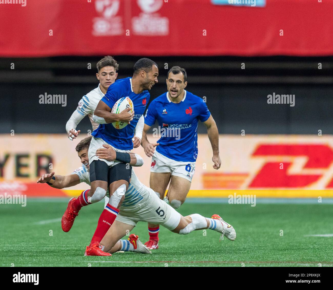 Vancouver, Canada. 5th March, 2023. Varian Pasquet (L) fends off the ...