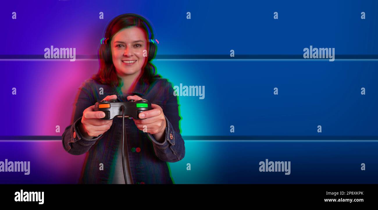 Beautiful Young Hispanic Woman Standing Front View Playing With A Video Game Console In Her