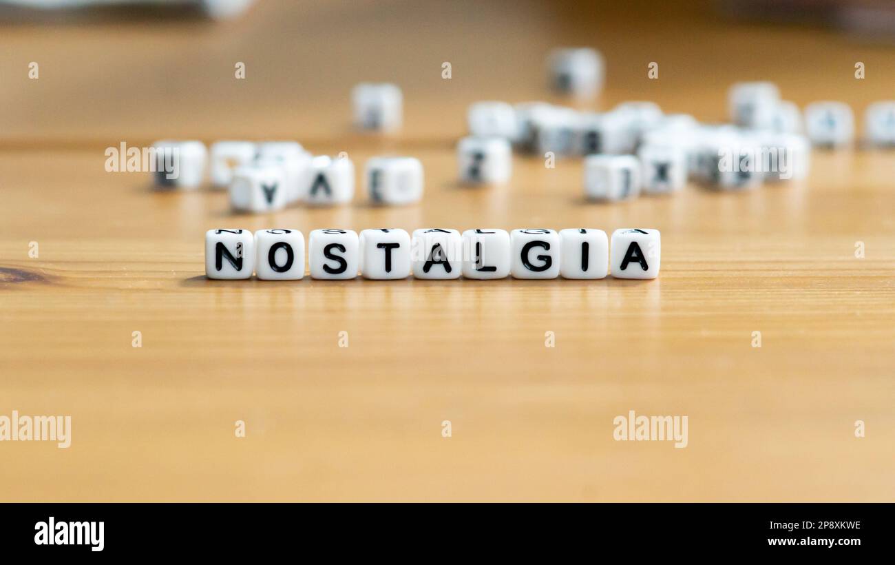 Nostalgia word in black block letter beads. Front view close up Stock ...
