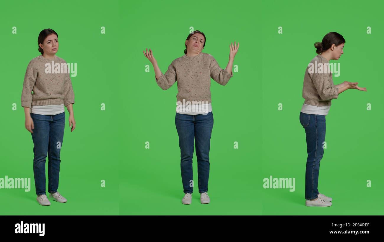 Upset frustrated woman acting angry on full body greenscreen, showing ...