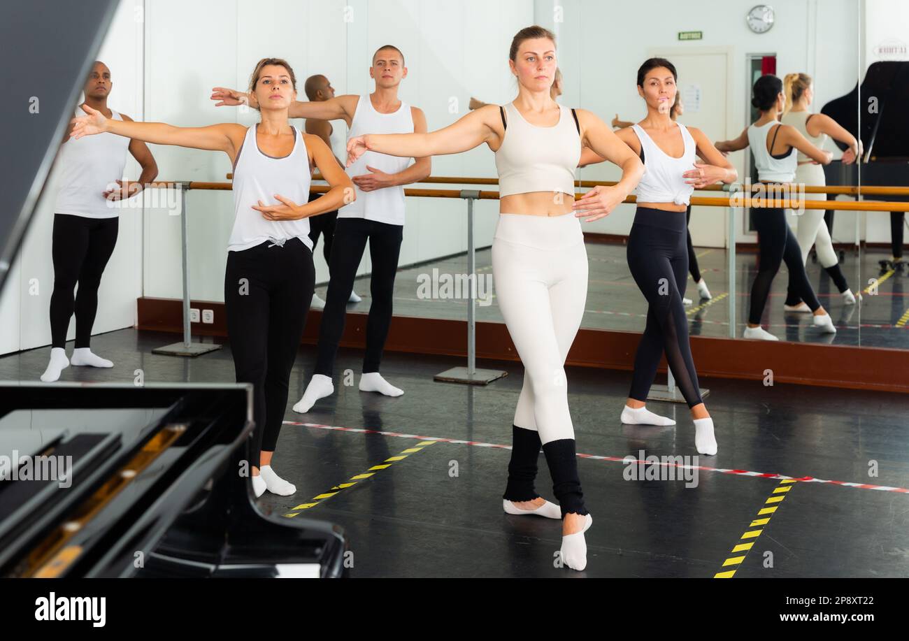 Ballet troupe performing dance in gum Stock Photo - Alamy