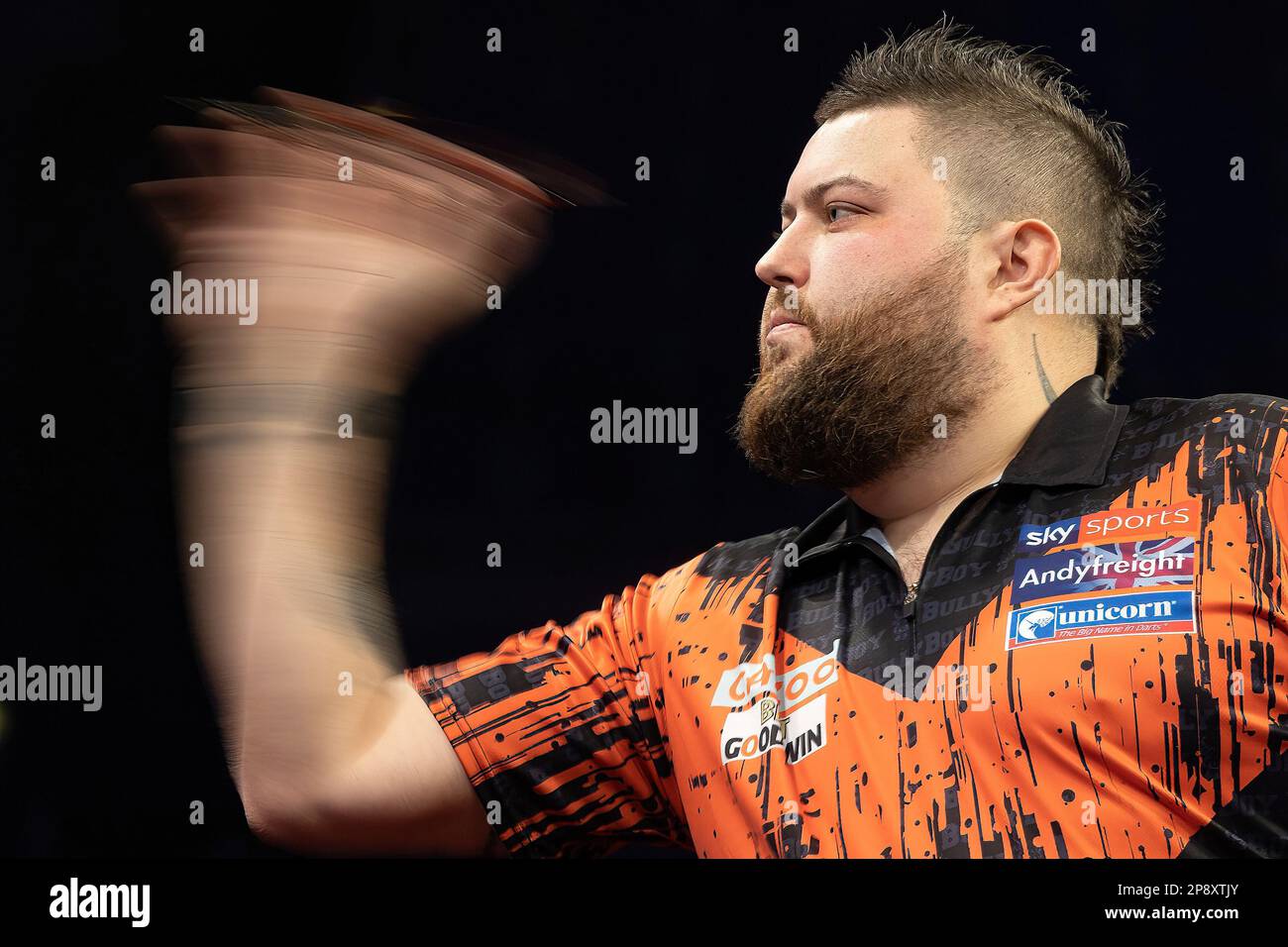 Michael Smith throws a dart during the 2023 Cazoo PDC Premier League ...