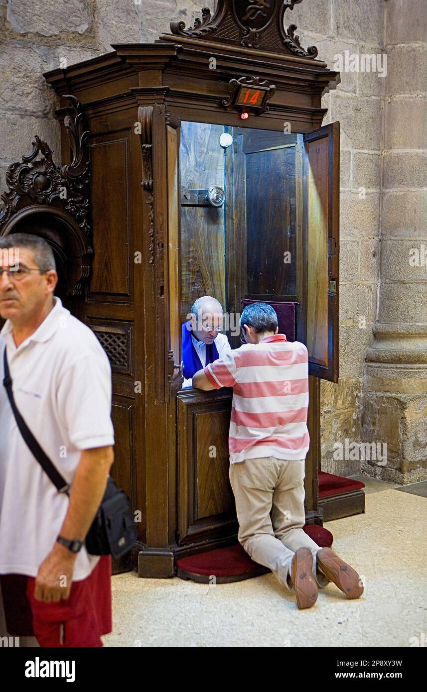 Man confessing her sins to a priest. Cathedral. Santiago de Compostela ...