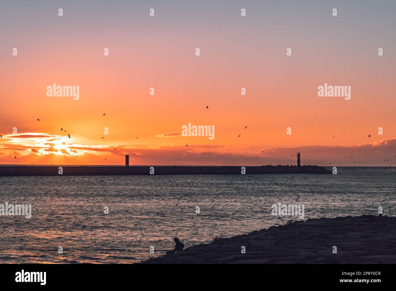 Barra Beach Sunset: A Serene View of Nature's Beauty Stock Photo - Alamy