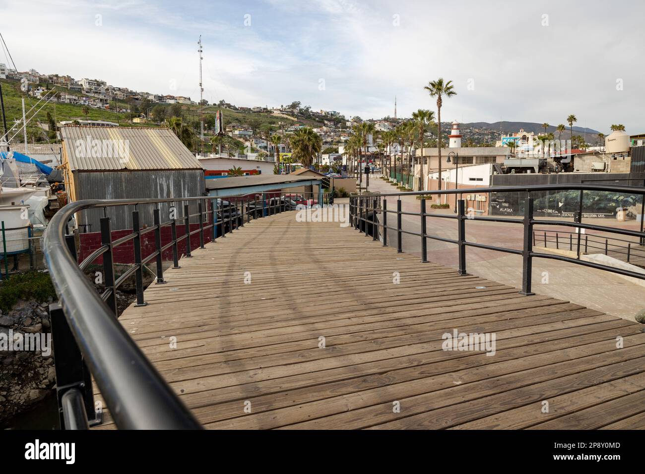Ensenada, Baja California, Mexico - A boardwalk ramp next to the harbor ...