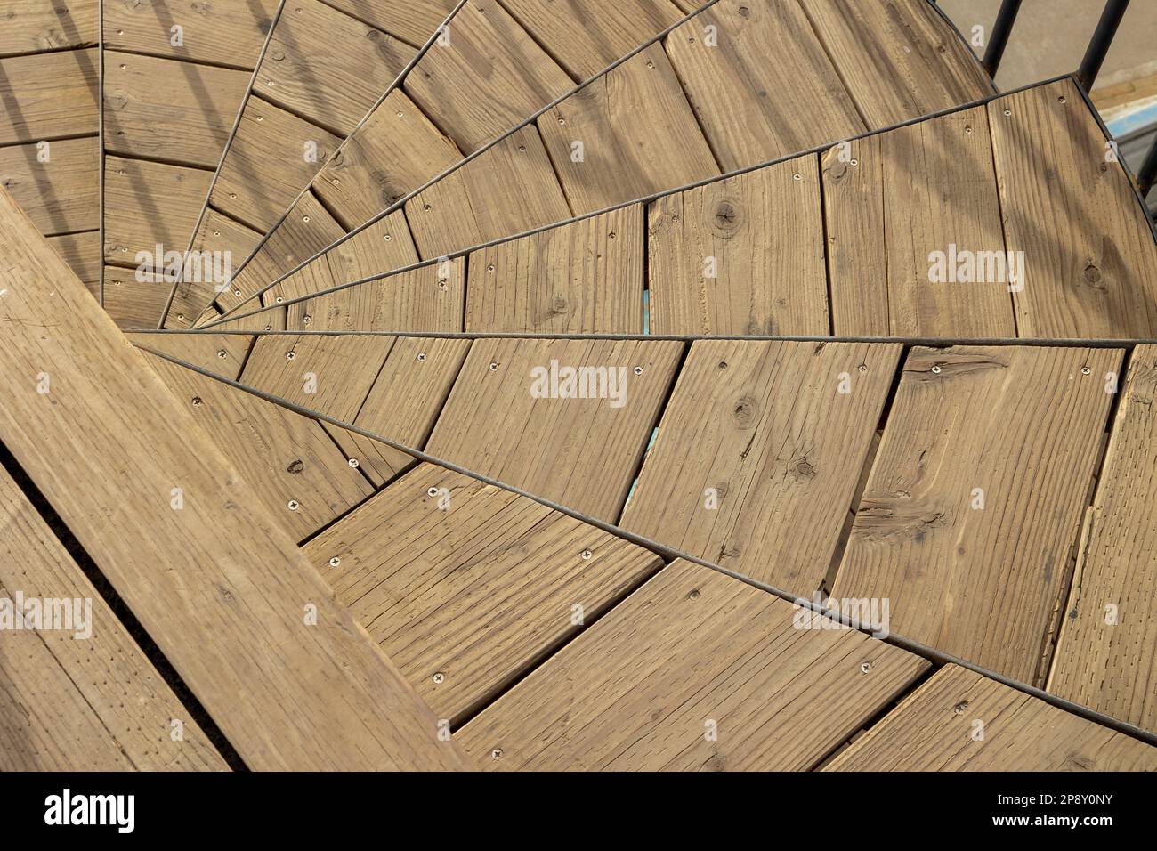 Top view of a spiral staircase with wooden board steps Stock Photo - Alamy
