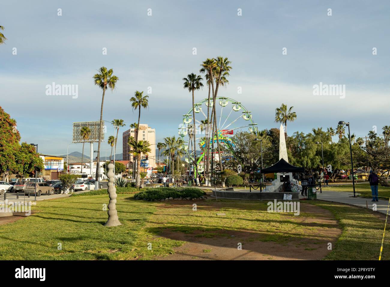 Ensenada, Baja California, Mexico - Park with ferris wheel and obelisk ...