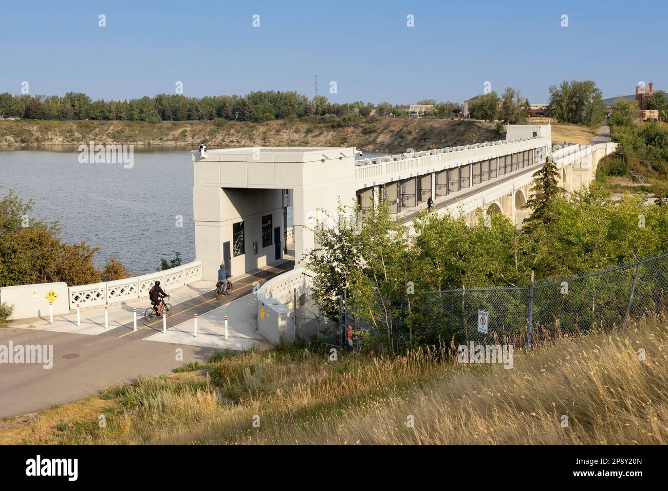 Calgary, Alberta, Canada - Cyclists crossing Glenmore Dam along ...