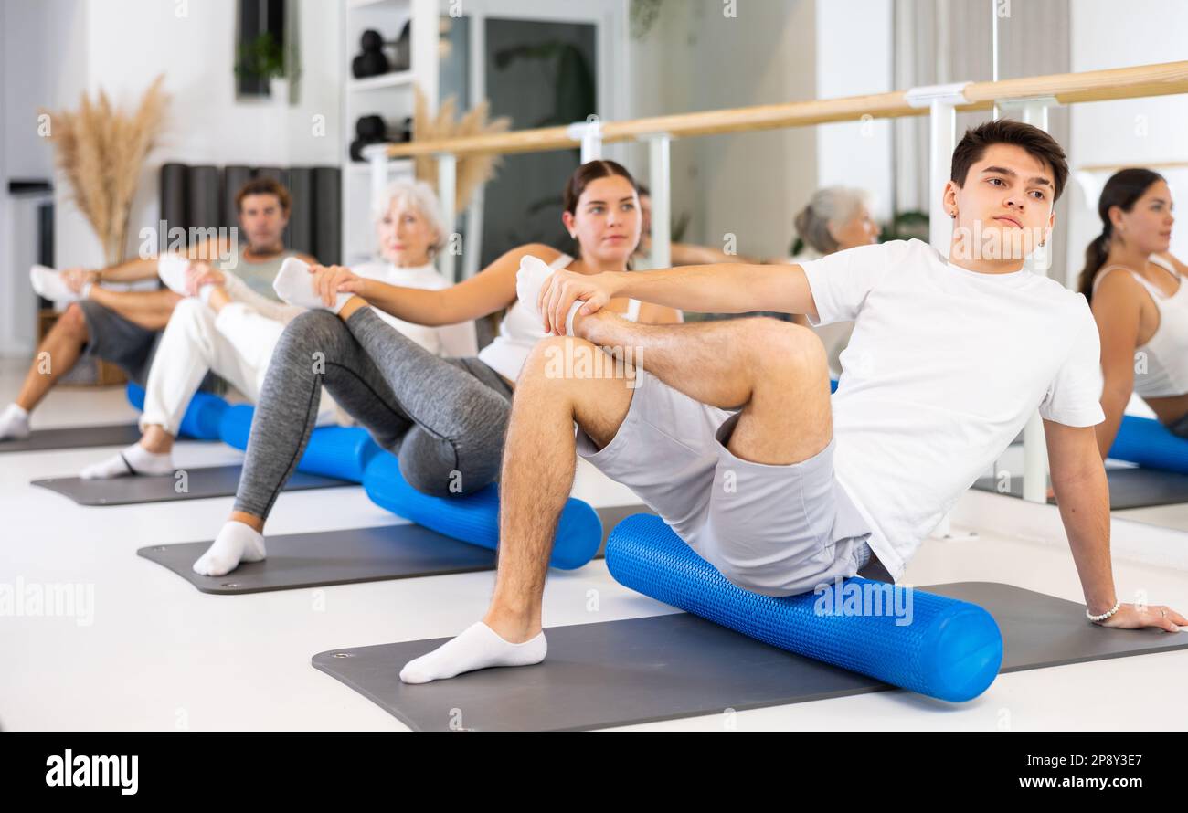 Guy performing pilates exercises hi-res stock photography and images ...