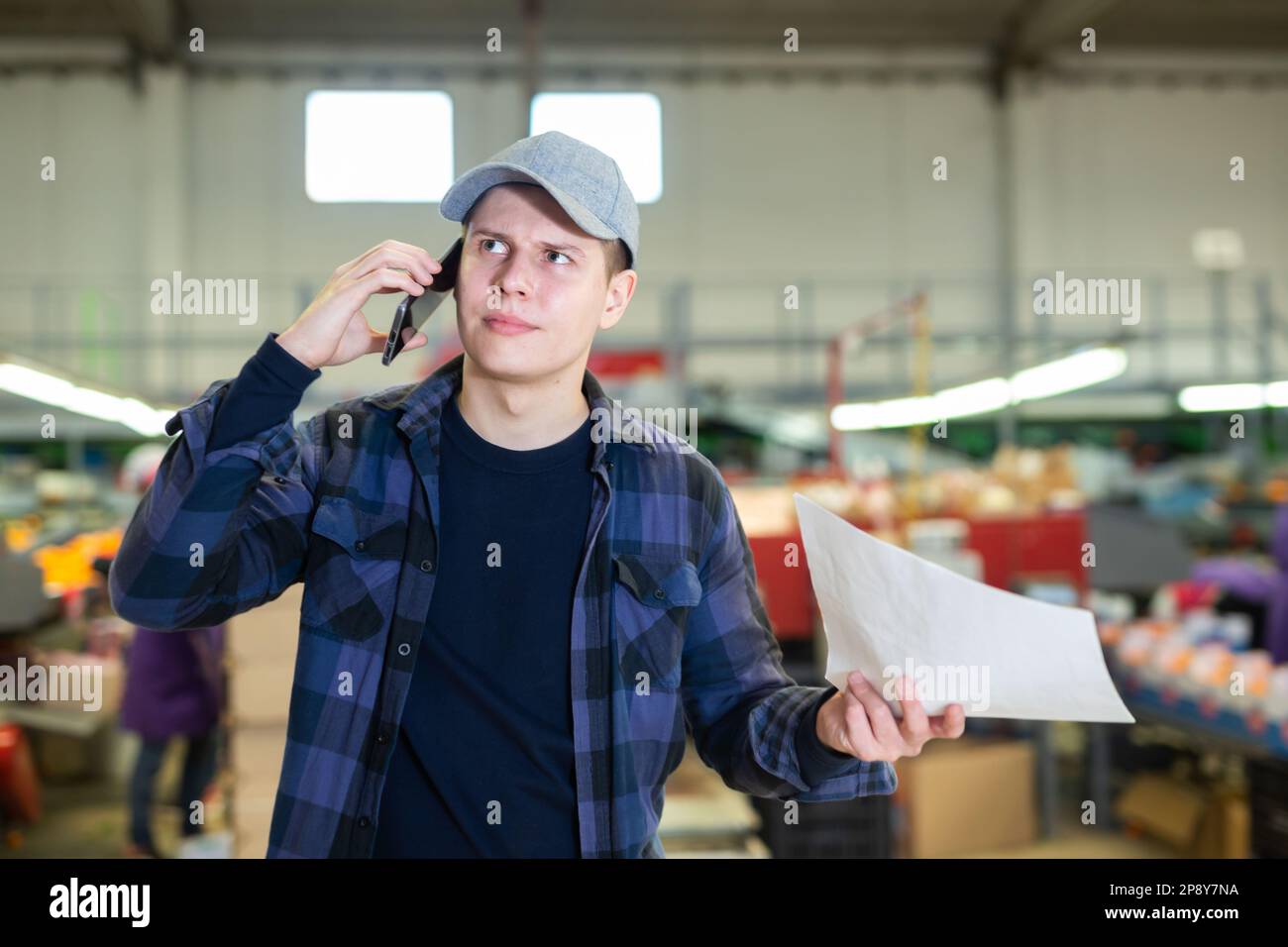Positive cheerful men worker conducts business negotiations on the ...