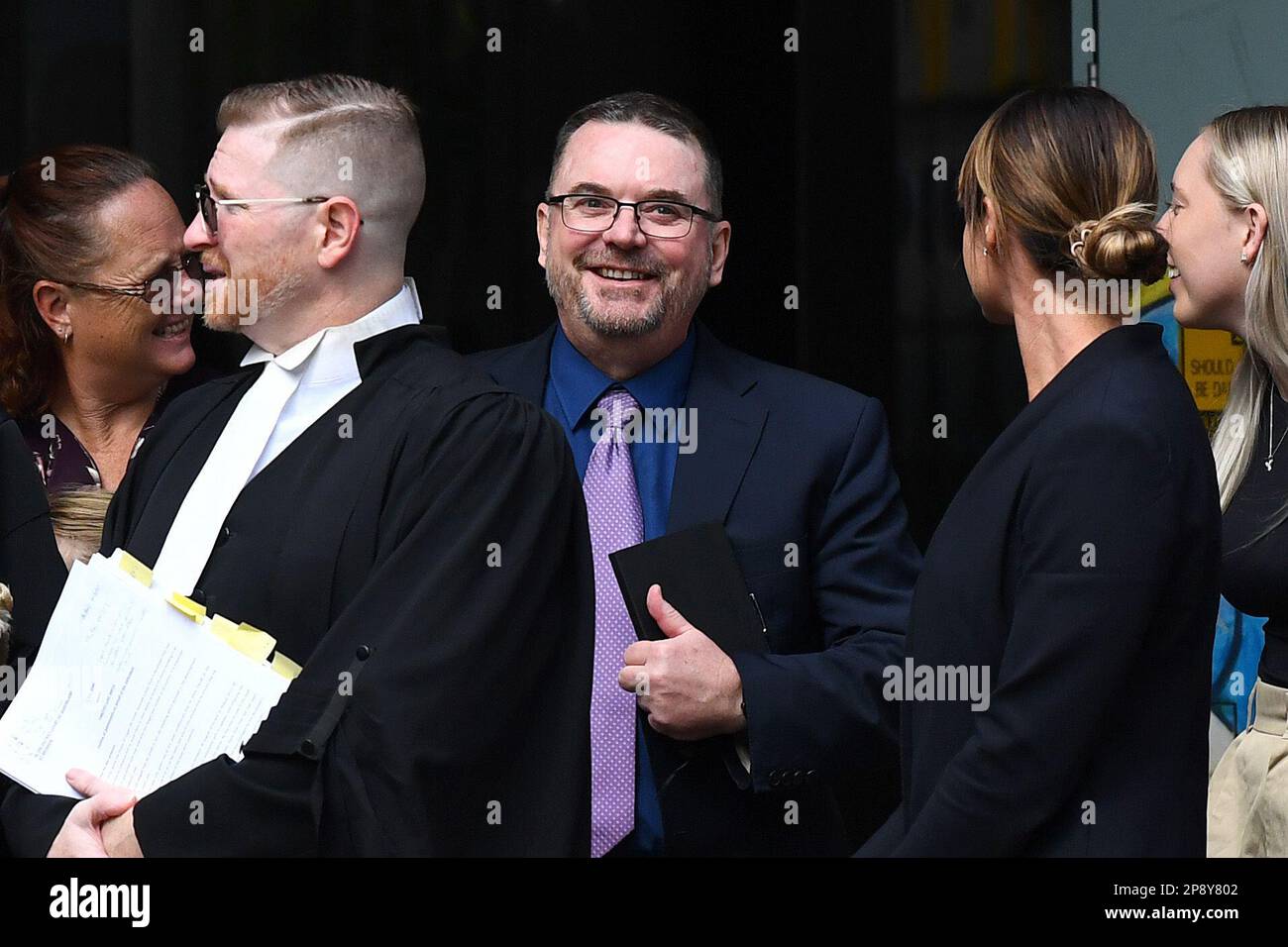 Former Logan City Council Mayor Luke Smith (centre) arrives to the ...