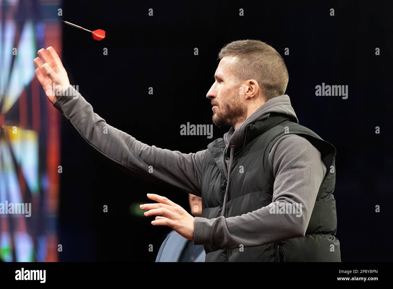 Professional Boxer Robbie Davies Jr. throws a dart during the 2023 ...