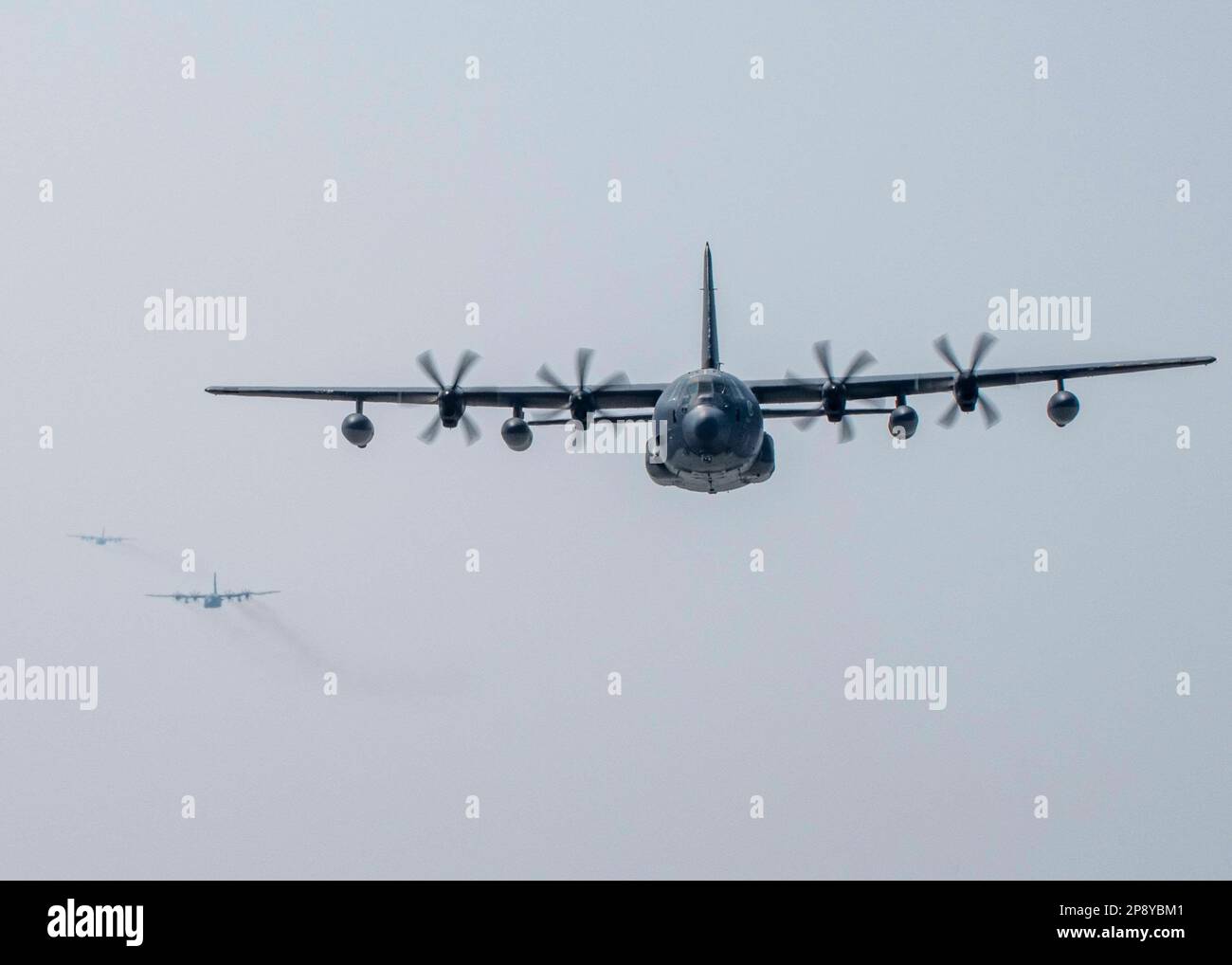 A 353rd Special Operations Wing MC-130J Commando II flies in formation ...