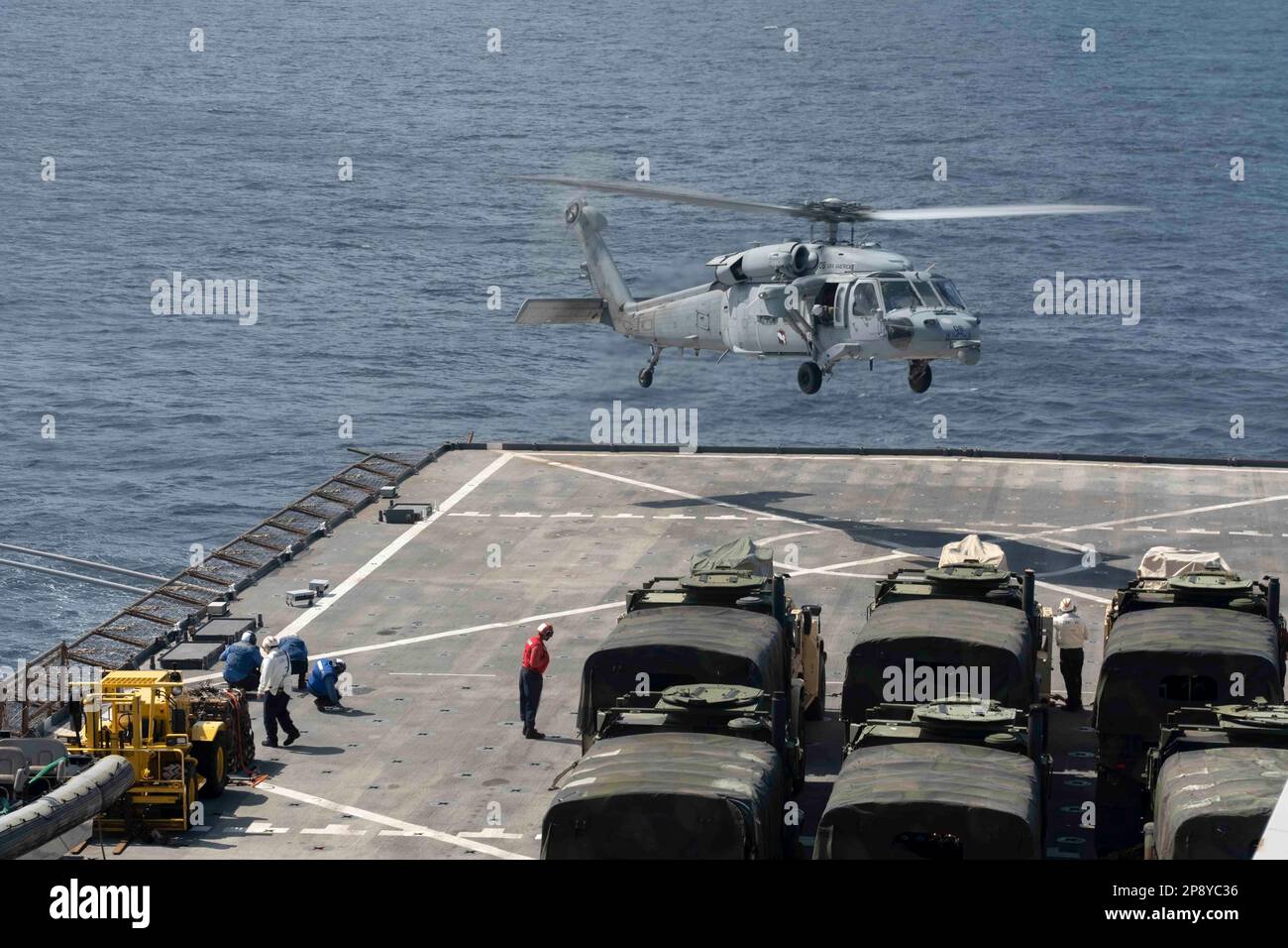A U.S. Navy MH-60 Seahawk with helicopter sea combat squadron 25, with ...