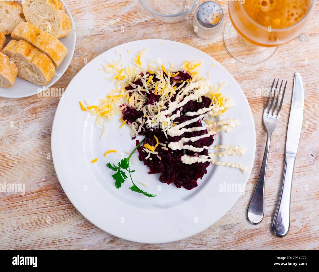 Salad of grated baked beetroot with cheese and mayonnaise Stock Photo ...