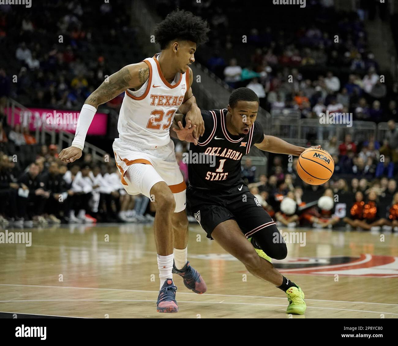 Oklahoma State guard Bryce Thompson (1) drives under pressured by Texas ...