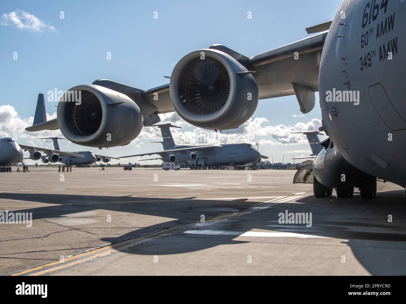 Heavy lift aircraft sit on the flight line at Travis Air Force Base ...