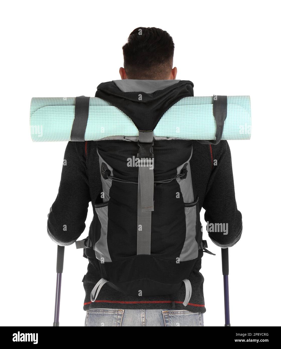 Male hiker with backpack and trekking poles on white background, back ...