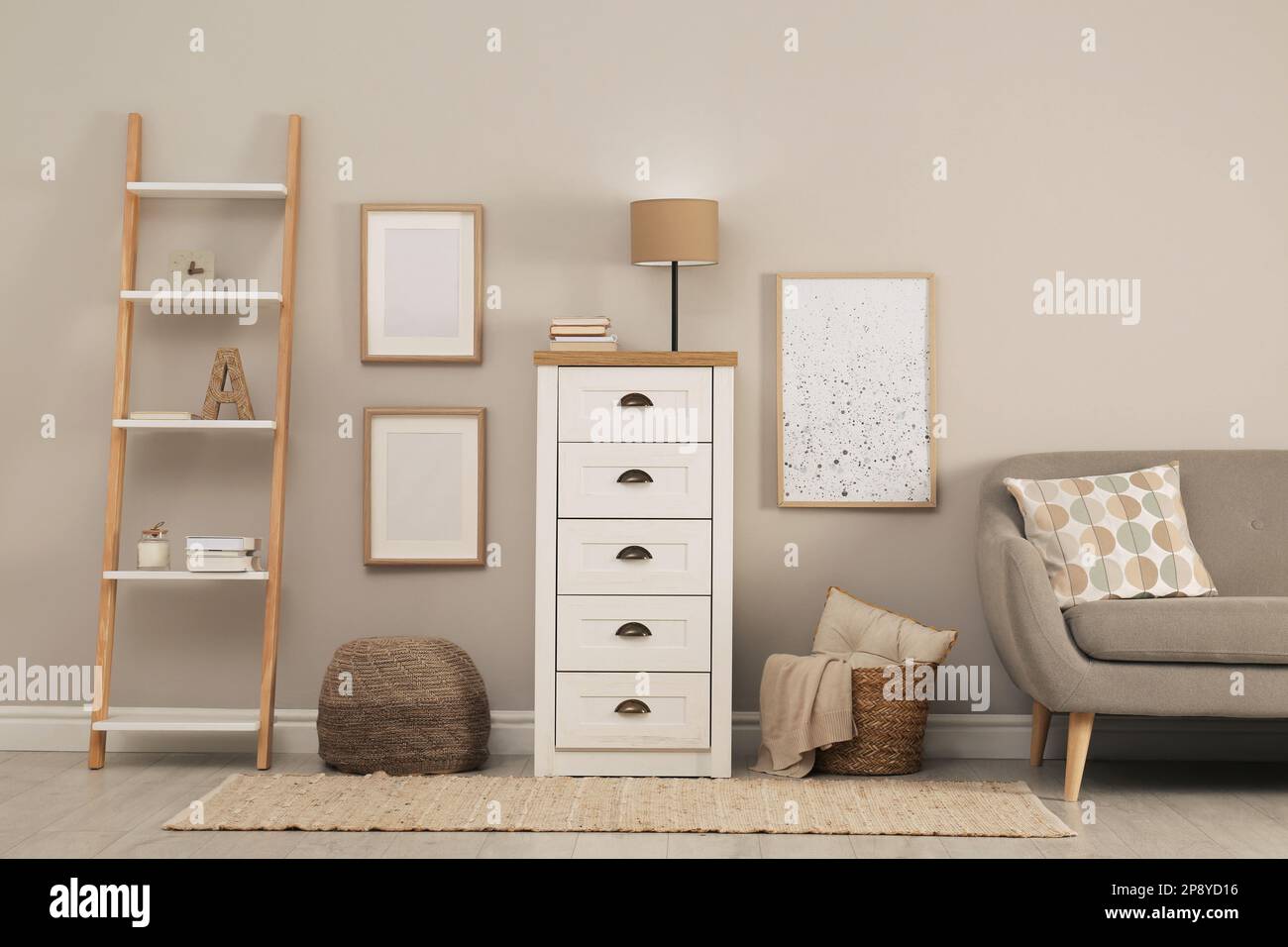 Modern room interior with chest of drawers near light wall Stock Photo ...