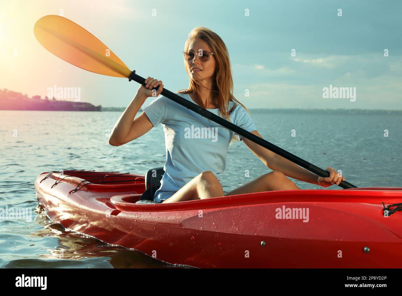 Beautiful woman kayaking on river. Summer activity Stock Photo - Alamy