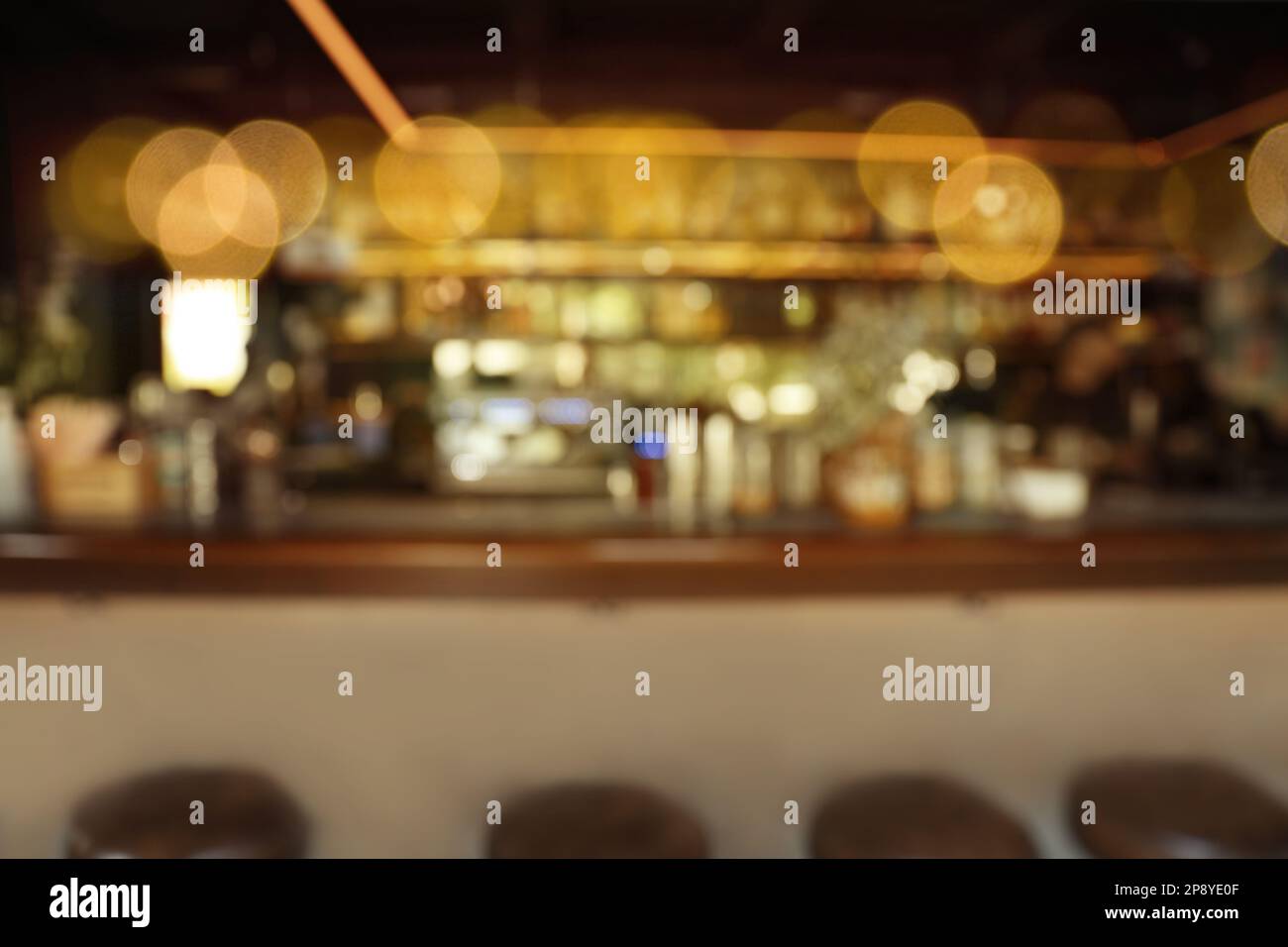 Blurred view of stylish modern bar interior with bokeh effect Stock ...