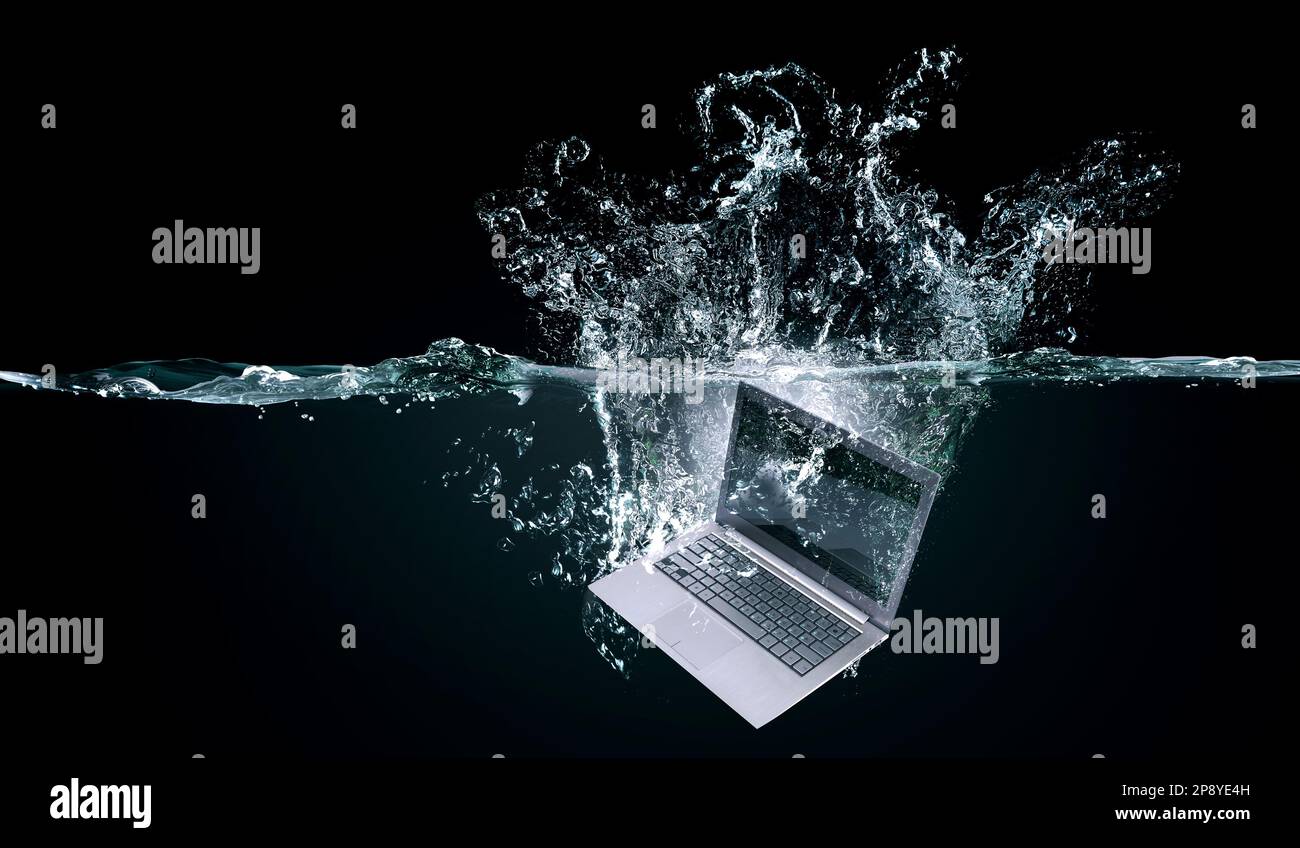Keyboard dropped into water . Mixed media Stock Photo - Alamy