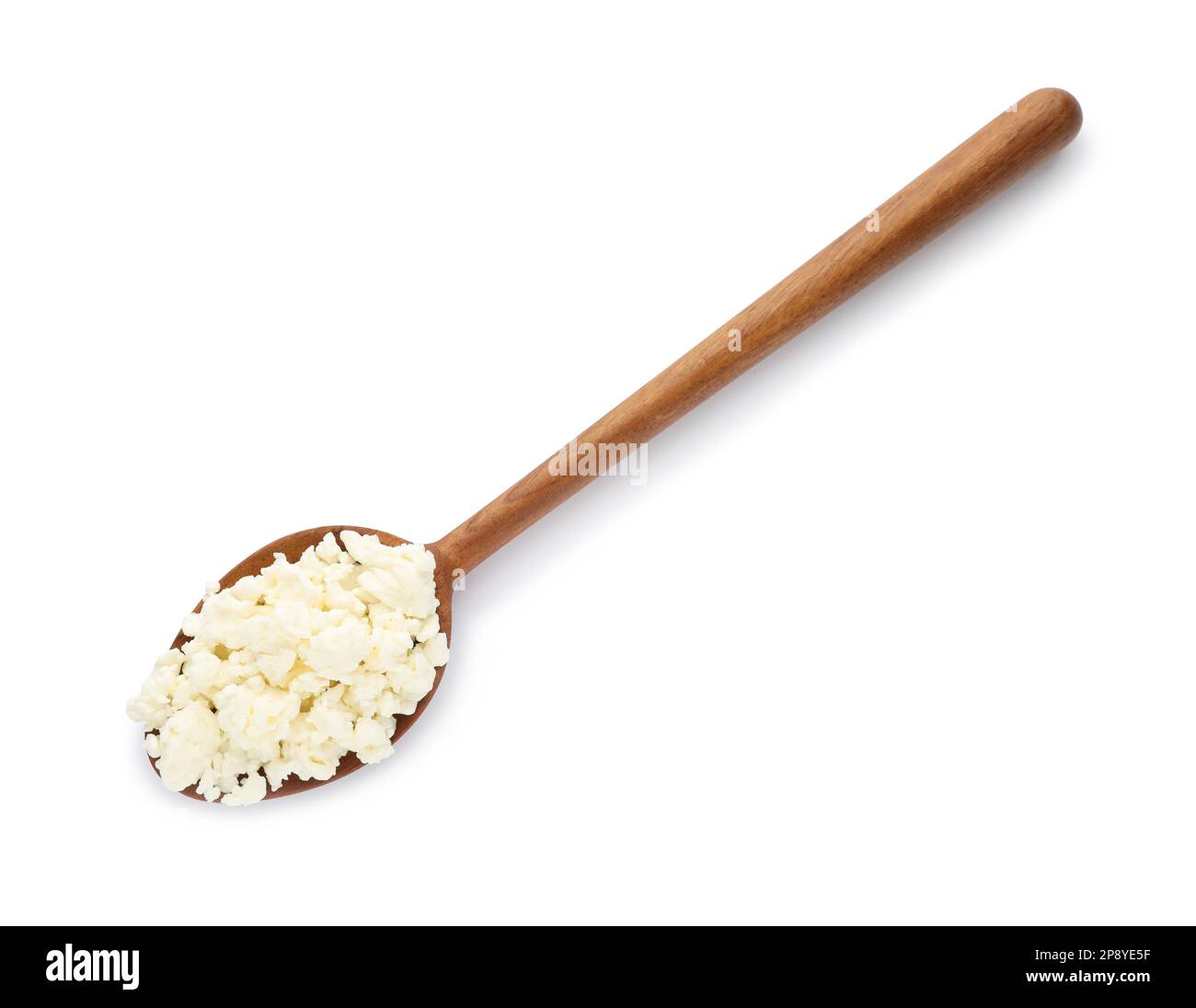 Delicious fresh cottage cheese in spoon isolated on white, top view ...