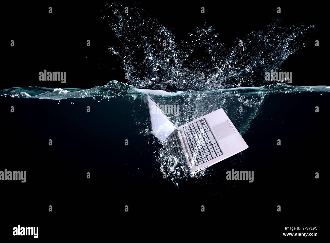 Keyboard dropped into water . Mixed media Stock Photo - Alamy