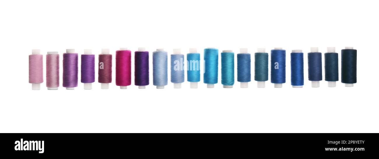 Set of colorful sewing threads on white background Stock Photo - Alamy