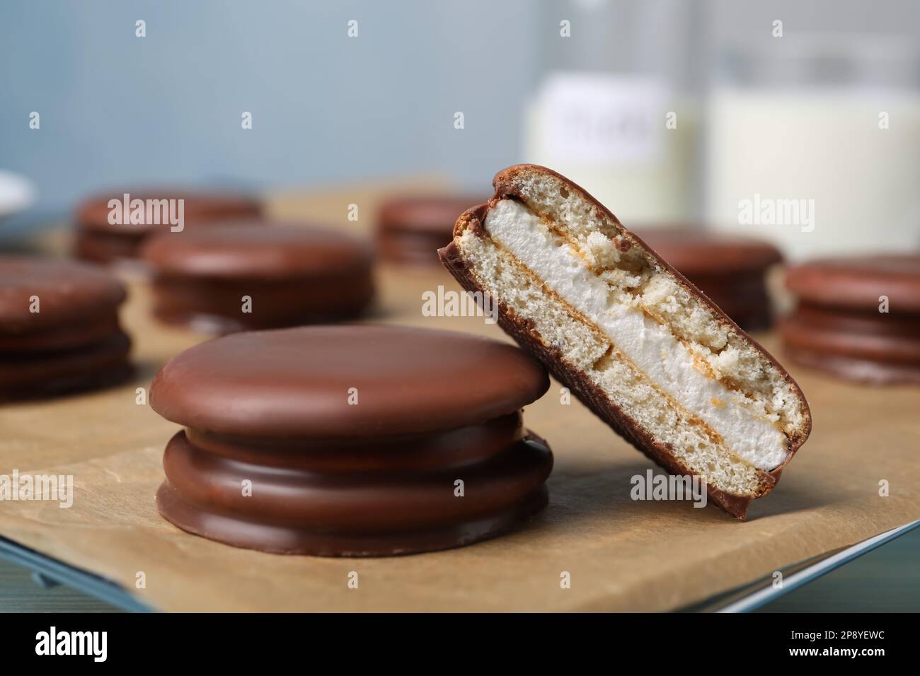 Tasty choco pies on parchment paper, closeup view Stock Photo - Alamy
