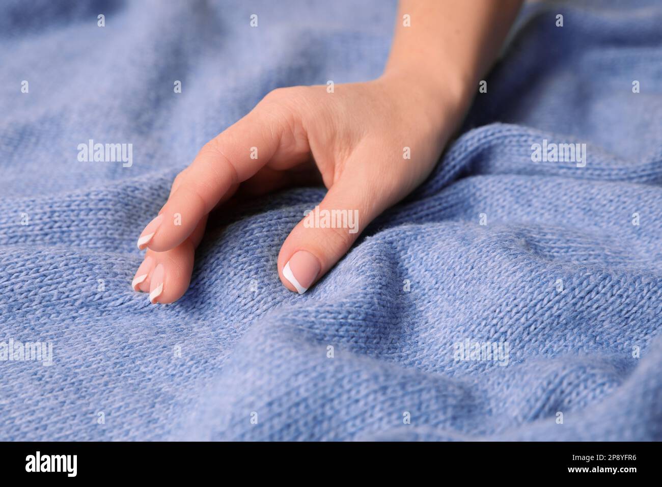Touching fabric hi-res stock photography and images - Alamy