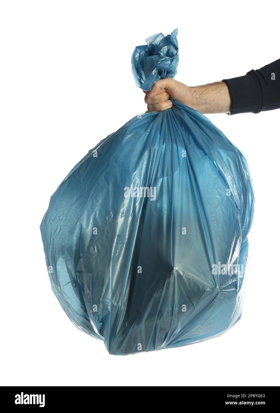 Man holding trash bag filled with garbage on white background, closeup ...