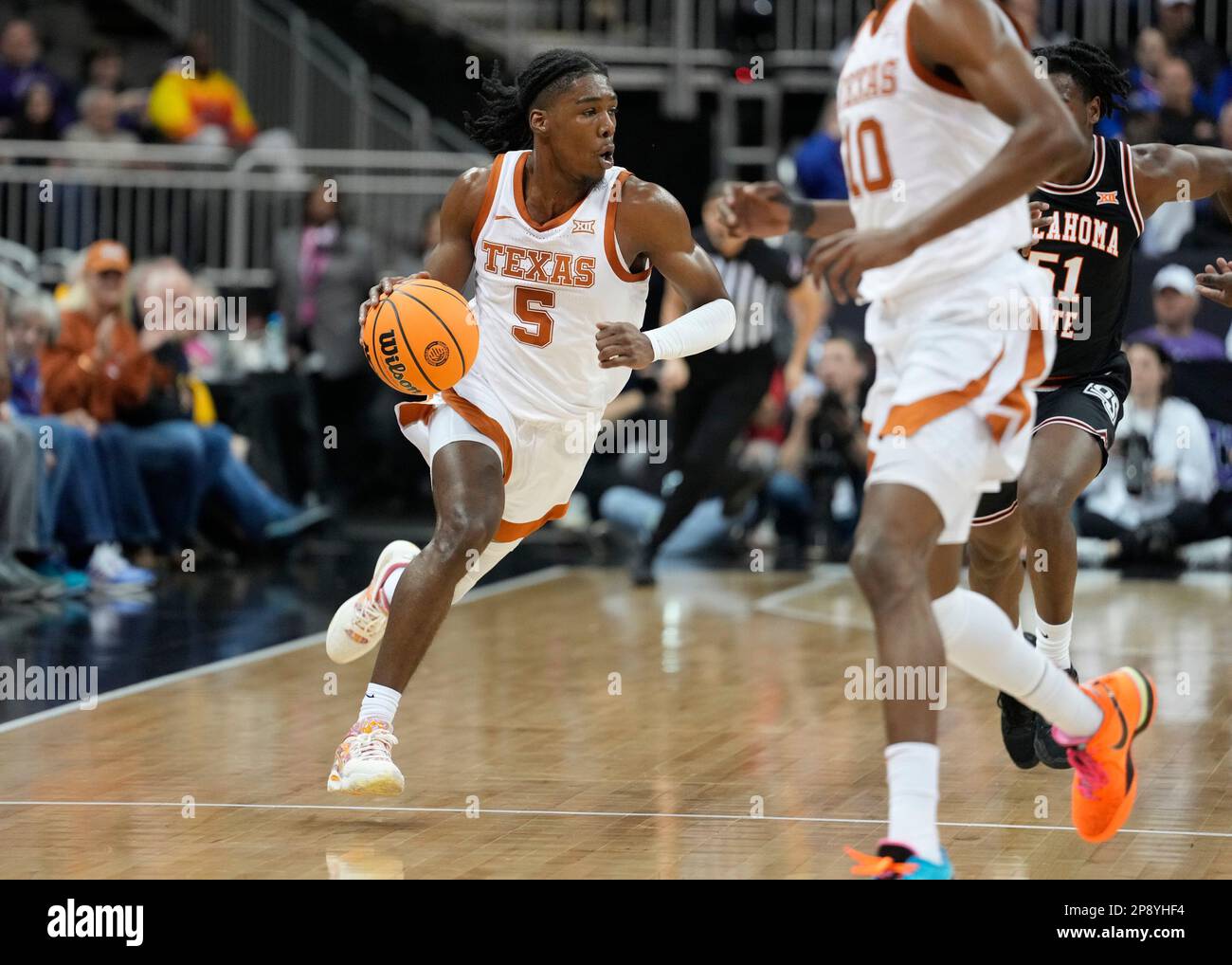 MAR 09 2023: Texas guard Marcus Carr (5) drives the ball up court in ...