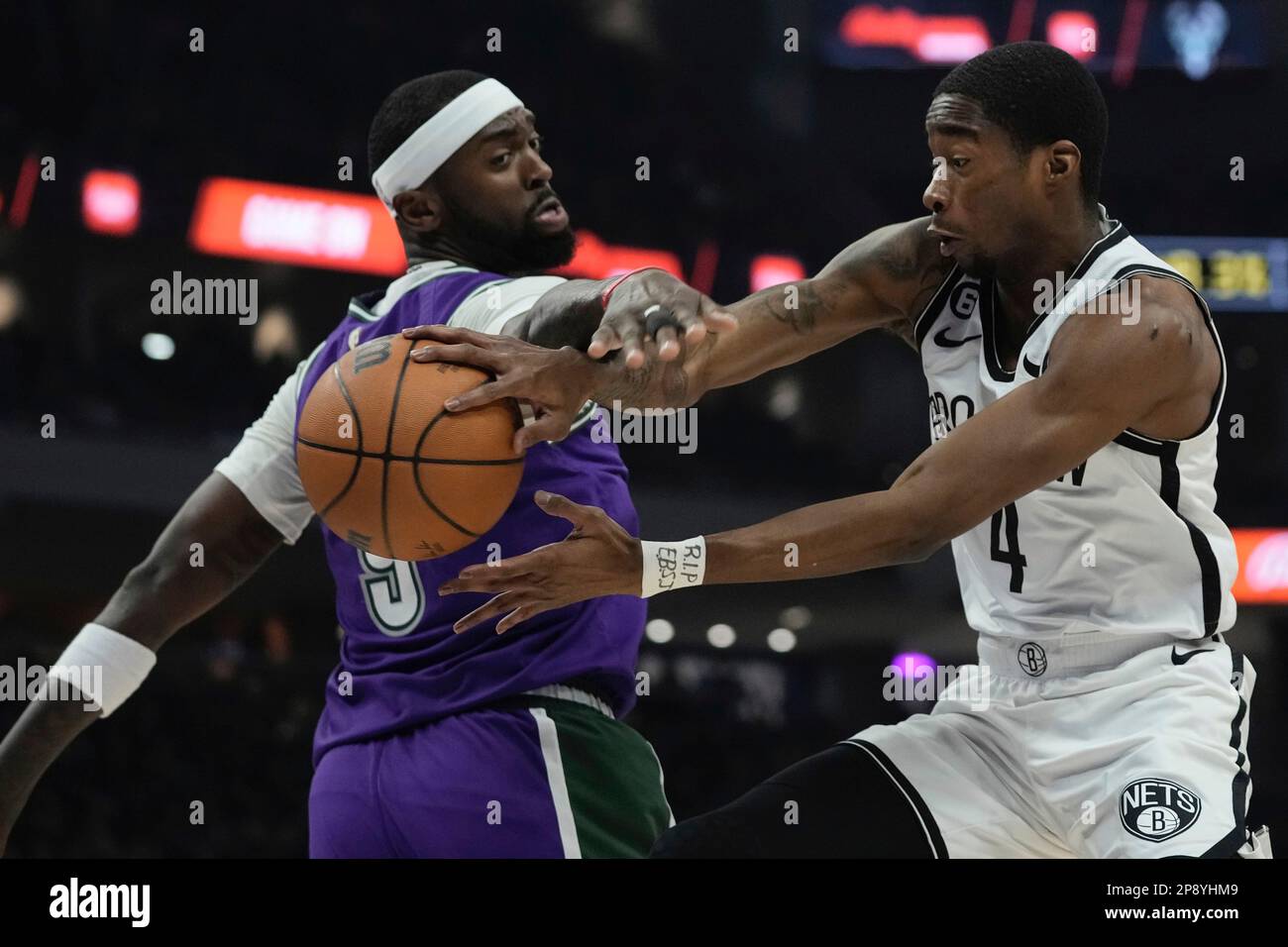 Brooklyn Nets' Edmond Sumner tries to pass around Milwaukee Bucks ...