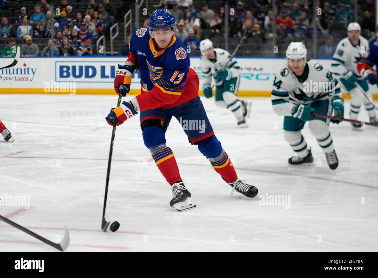 St. Louis Blues' Alexey Toropchenko (13) handles the puck as San Jose ...