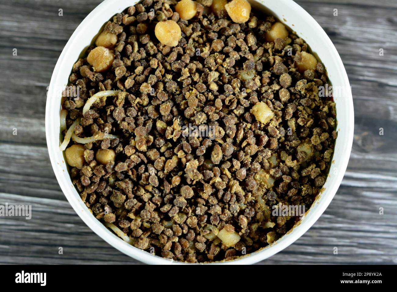 Egyptian cuisine of Koshary, a popular street food made of rice ...