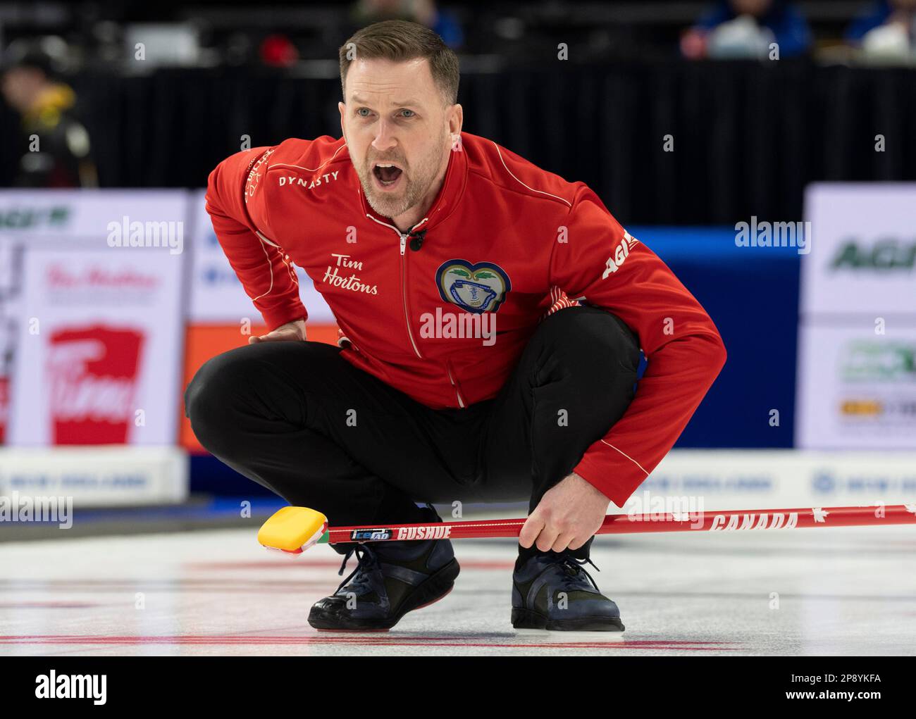 London, Ont, March 9, 2023. Team Canada skip Brad Gushue calls a sweep ...
