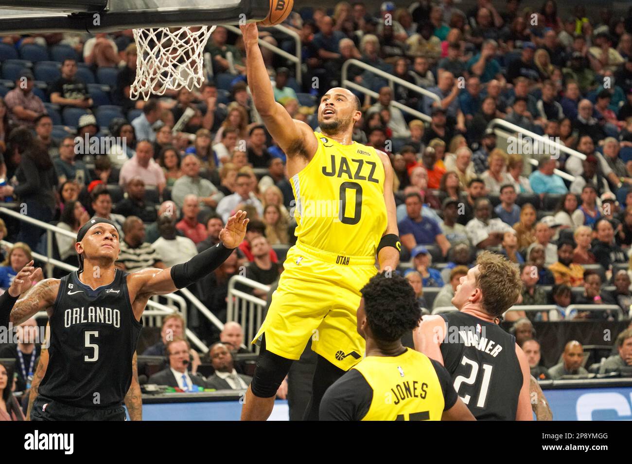 Orlando, Florida, USA, March 9, 2023, Utah Jazz guard Talen Horton-Tucker #0 attempt to score ...