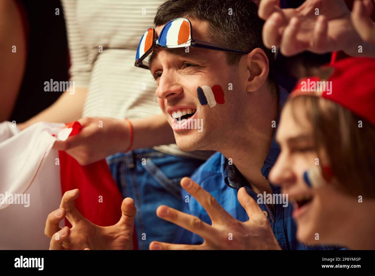 Tense game moment. Football, soccer fans emotionally cheering up ...