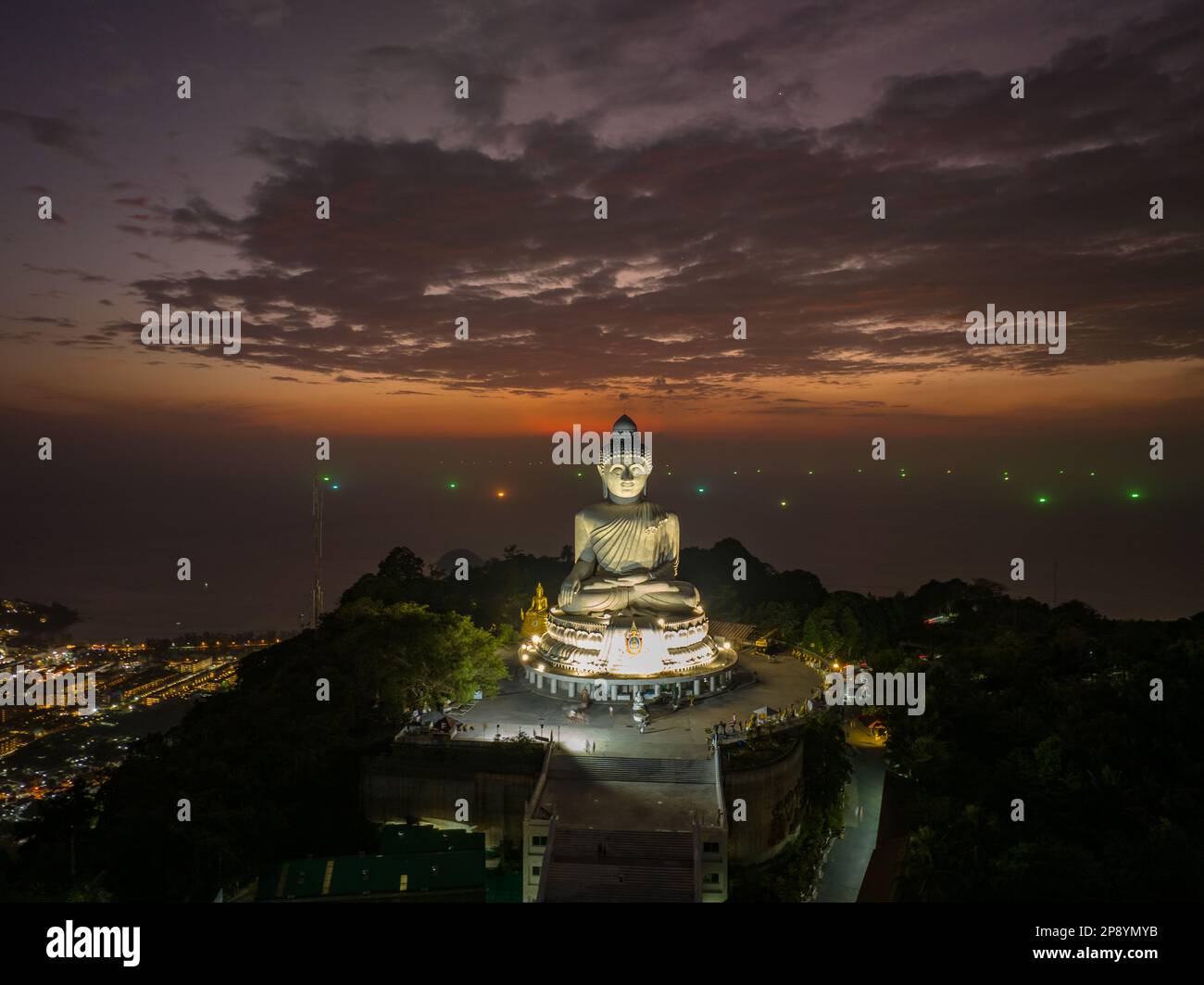aerial view amazing red sky at Phuket big Buddha in quite twilight ...
