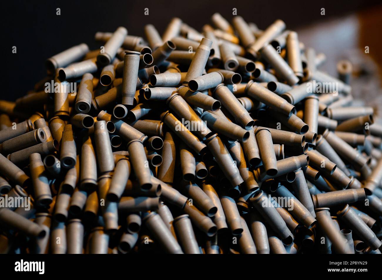 Shell casings ammunition production workshop Stock Photo - Alamy