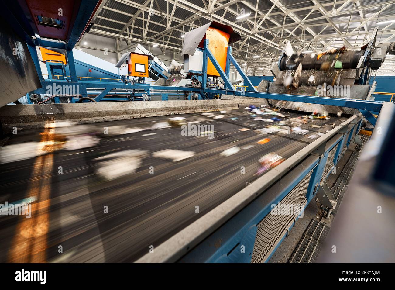 Wide belt conveyor with moving debris. Waste sorting plant Stock Photo ...